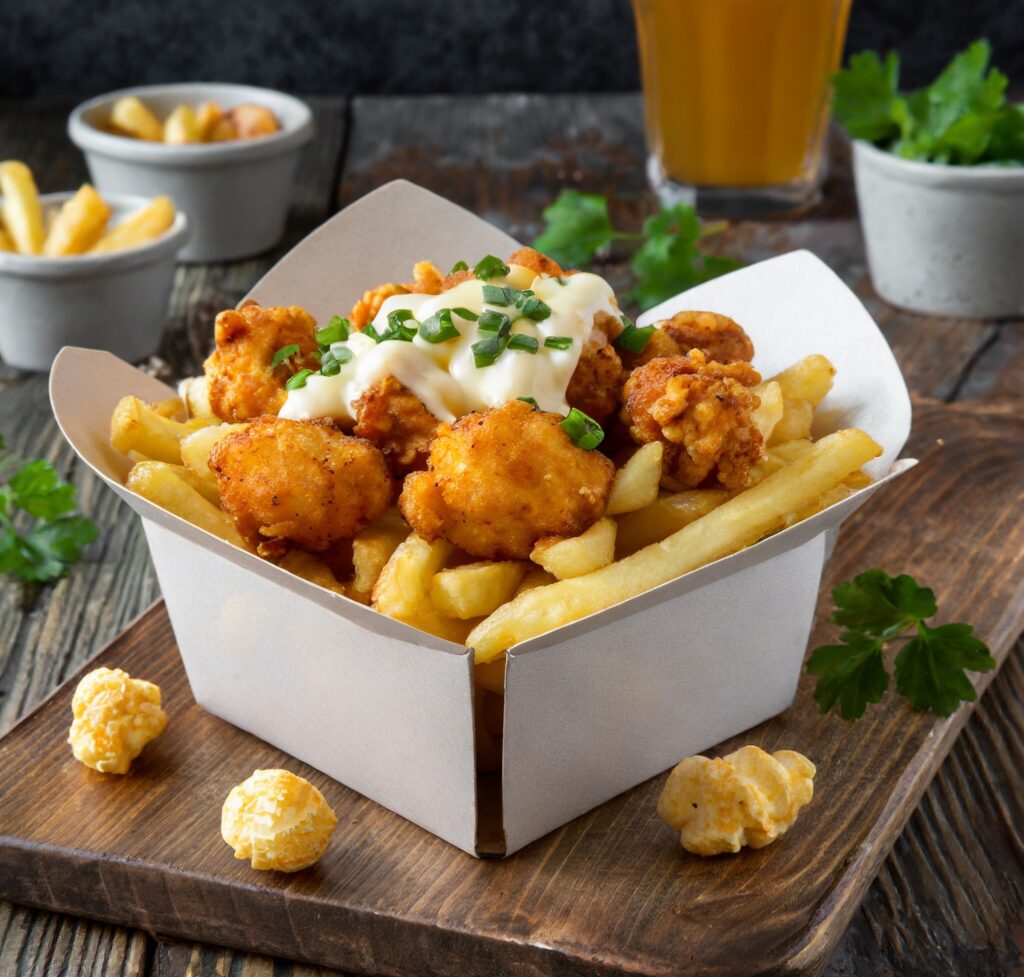 Popcorn Chicken Poutine - ChickAsta